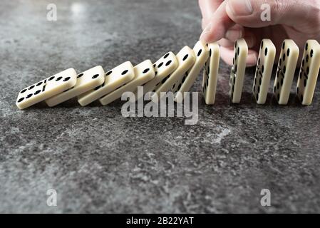 Close-up Of A Male Hand Stopping The Persons From Falling On Desk Stock ...