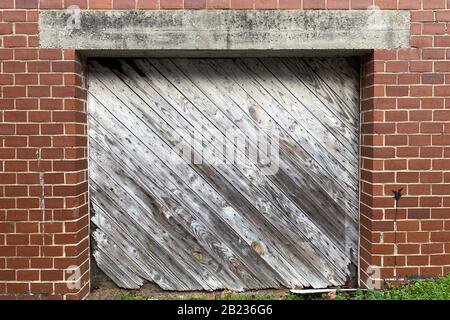 Exterior of old brick warehouse with loading dock Stock Photo - Alamy