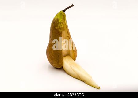 Pear standing with a cut out piece on a white background Stock Photo ...
