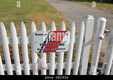 USA United States Government property no trespassing sign on fence of ...
