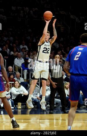 Butler forward Sean McDermott (22) takes a shot during an NCAA college ...