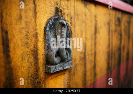 A small statue of the Snake, the temple of the serpent in India Gokarna ...