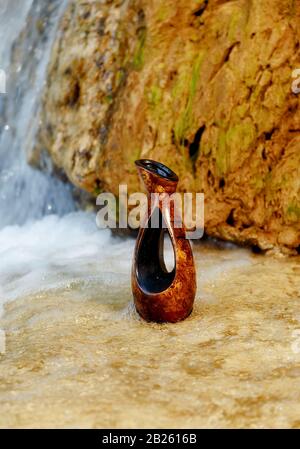 water in decenter at the waterfall Stock Photo - Alamy