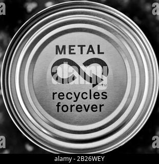 Metal recycles forever on the lid of some tinned food UK Stock Photo ...