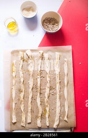 Preparing crunchy breadstick step by step visual guide on a white and ...