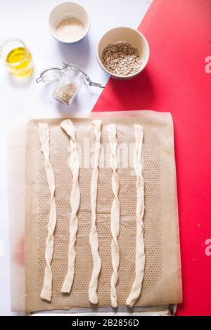 Preparing crunchy breadstick step by step visual guide on a white and ...