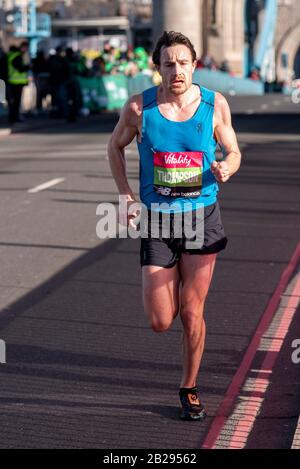 Chris Thompson running in the Vitality Big Half half marathon crossing ...