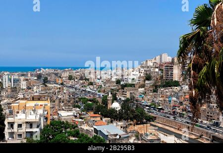 View of skyline of Tripoli (Trablous), Lebanon on a sunny day through a ...
