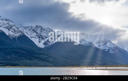 sun rays beaming down on Michaels Mount, Cornwall through stormy skies ...