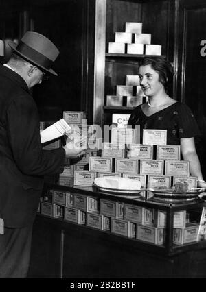Prohibition: A woman selling "wine bricks" (Compressed grapes which ...