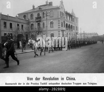 Chinese soldiers march during a military parade commemorating the 80th ...