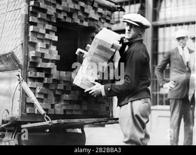 Prohibition: Policemen search a car that was used to smuggle alcohol ...