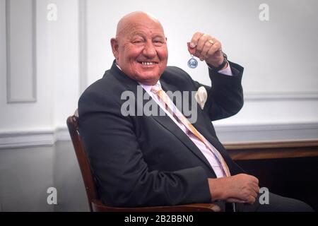Former heavyweight boxer Ronnie Russell poses with the George Medal he ...