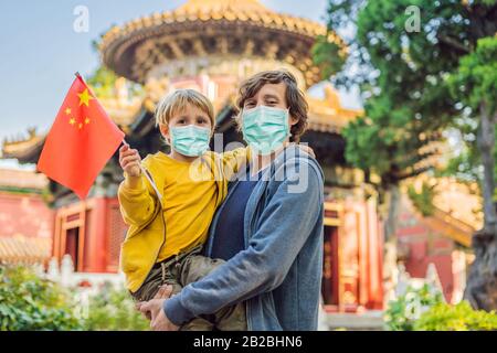 Enjoying vacation in China. Dad and son in Forbidden City. Travel to ...