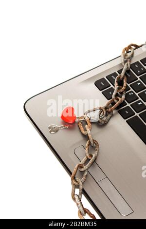 Laptop with chains Stock Photo - Alamy