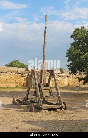 A Wooden Ballistic Device Of A Medieval Catapult. Ancient military ...