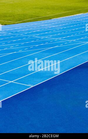 Photo of blue stadium tracks Stock Photo - Alamy
