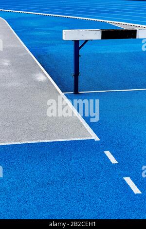 Photo of blue running tracks Stock Photo - Alamy