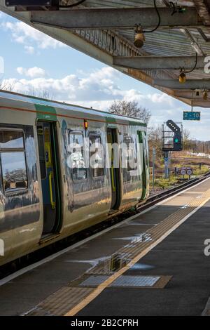 class 313 electric multiple unit train in the platform on the southern ...