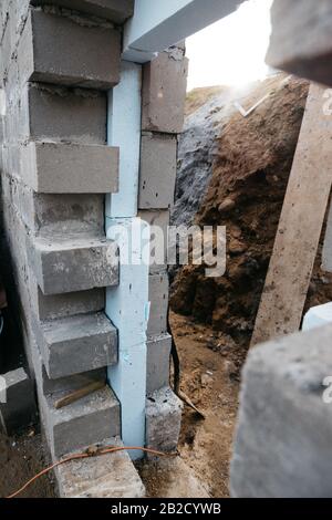 construction of a three-layer wall with insulation Stock Photo - Alamy