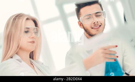 A medical professional tests a woman for coronavirus in Elad, Israel ...