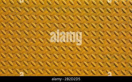 Yellow steel diamond plate useful as a background Stock Photo - Alamy