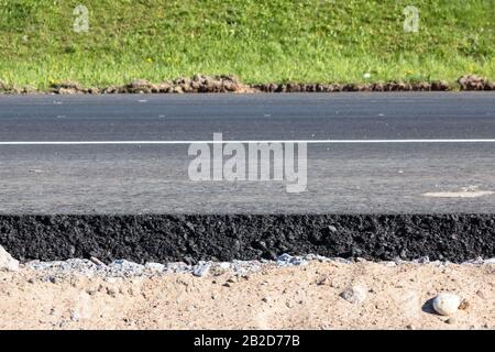The layer of asphalt road with soil and rock Stock Photo - Alamy