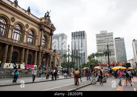 Crowd of people partying at street brazilian carnival parade. Overview ...