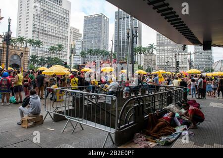 Crowd of people partying at street brazilian carnival parade. Overview ...