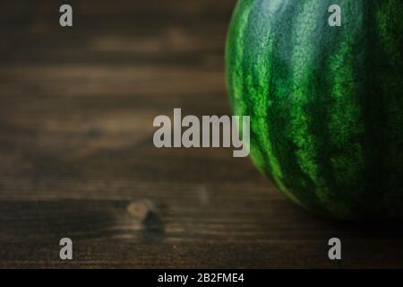 Close-up view of whole undivided watermelon. Green fresh watermelon on ...