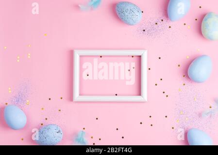 Festive Easter frame from small easter eggs on white background. Stylish easter flat lay Stock ...
