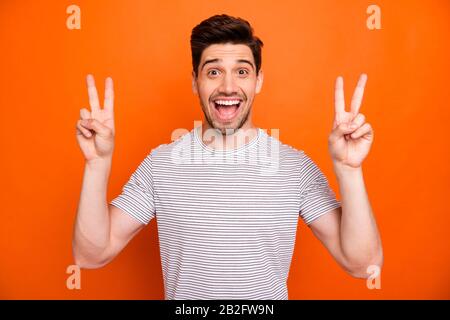 Photo of funny excited person raise opened arms beaming smile isolated ...