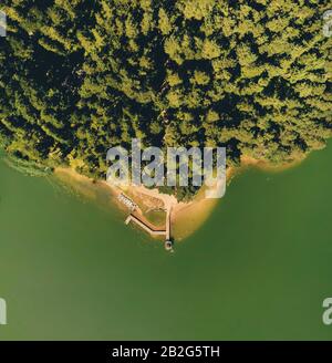 Aerial view of the lake in Lithuanian forests, winter, wild nature ...