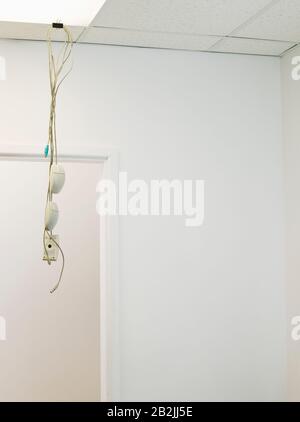Tangled Hanging from Office Ceiling Stock Photo - Alamy