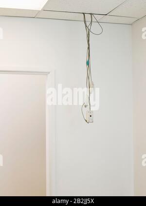 Tangled Hanging from Office Ceiling Stock Photo - Alamy