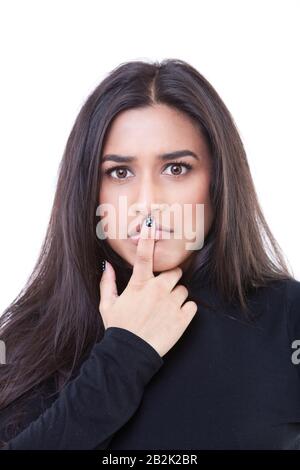 Indian woman looking grumpy Stock Photo - Alamy