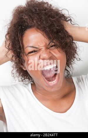 Young woman frustrated at her messy hair Stock Photo - Alamy