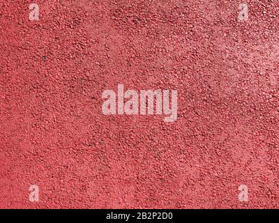 red tarmac texture useful as a background Stock Photo - Alamy