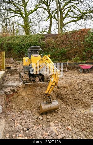 Excavator back view Stock Photo - Alamy
