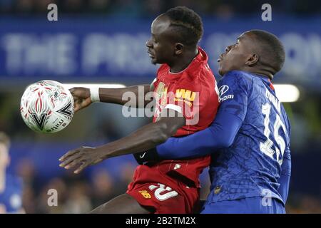 Sadio Mane of Liverpool holding off Marcos Alonso of Chelsea during the ...