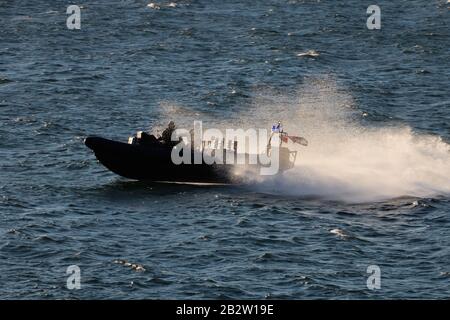 A Ministry of Defence Police RHIB (or RIB) providing escort and ...