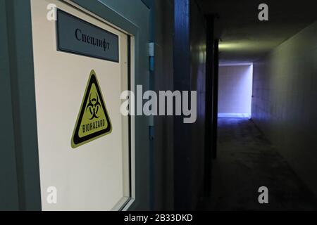 Biohazard sign on door in the Nebraska State Crime Lab Stock Photo - Alamy