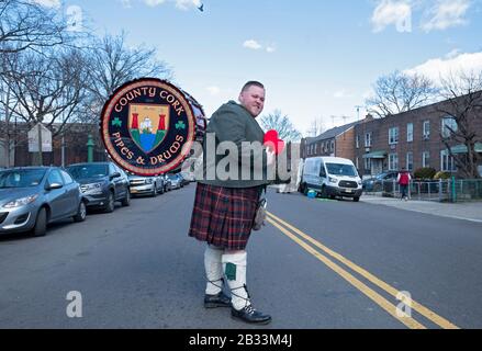 A drummer with the County Cork Pipe and Drum band marching in the 2011 ...