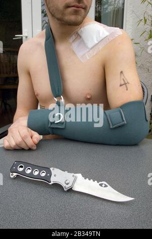 Knife crime UK Posed by model Stock Photo - Alamy