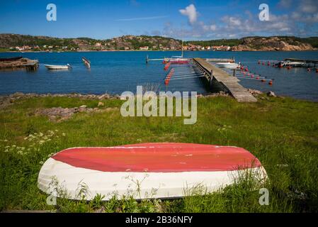 Sweden, Bohuslan, Bovallstrand, harbor view with boat Stock Photo - Alamy