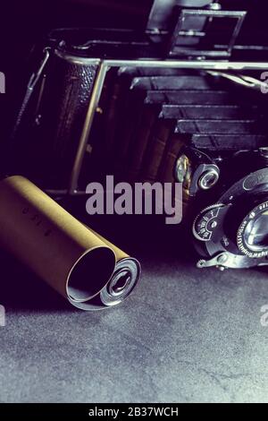 ancient camera with film - close up Stock Photo - Alamy