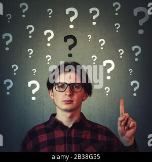 Nerd, portrait or glasses for questions, confused or doubt face ...