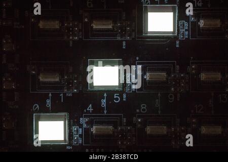 The process of checking several oled displays on the test station ...