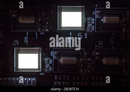 The process of checking several oled displays on the test station ...