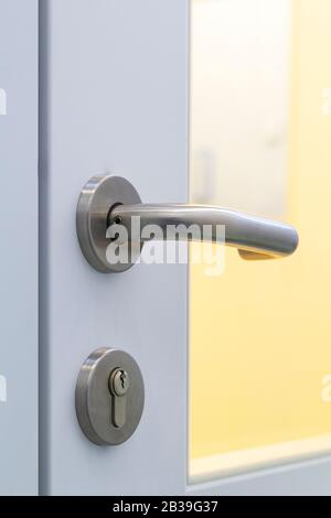 The steel door handle Inside white sterile cleanroom Stock Photo - Alamy